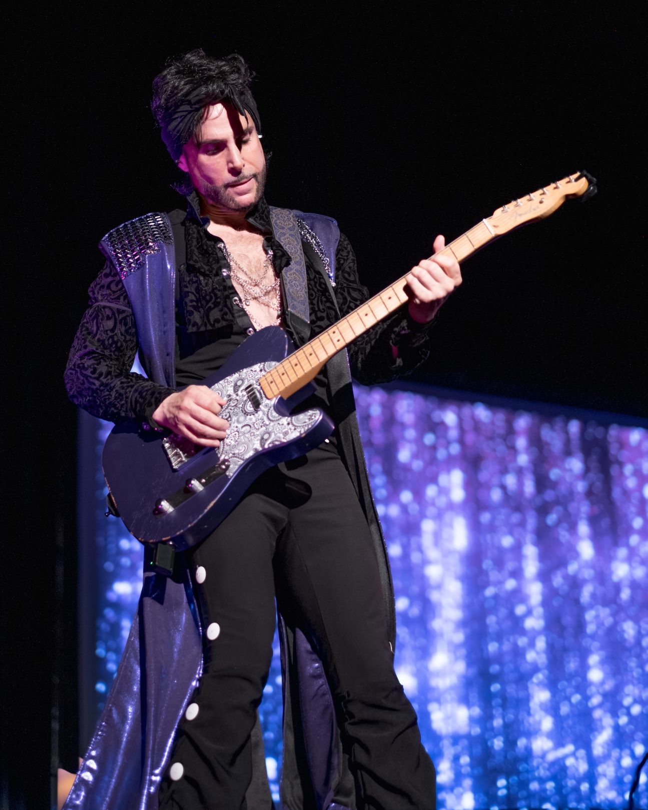 NEWS - Prince tribute artist rocks Paul Poag - 830Times
